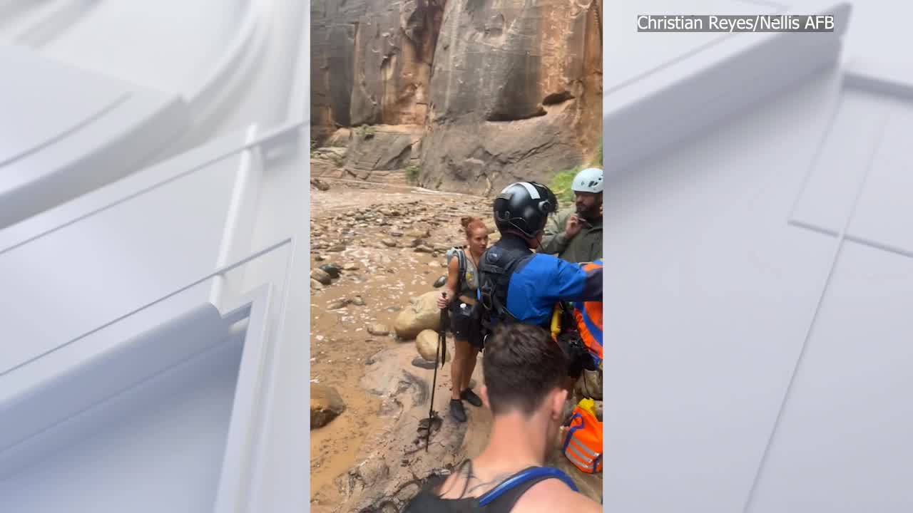 Airmen rescue group, including pregnant woman, from flash flood ...