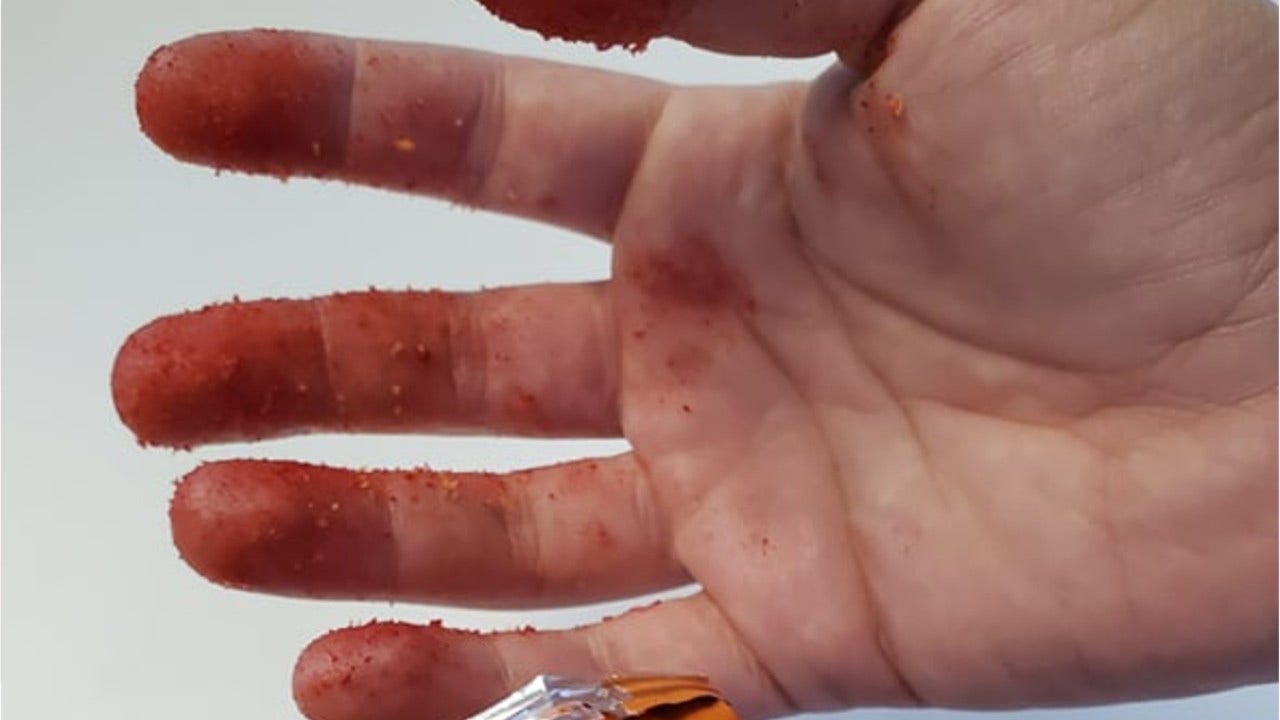 Cheetos announces official name for cheesy dust that sticks to fingers ...