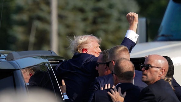 Photos of Pres. Trump hugging fallen Marine's son go viral