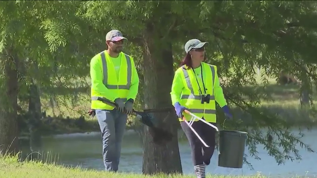 OUC workers gathered to clean up park | FOX 51 Gainesville