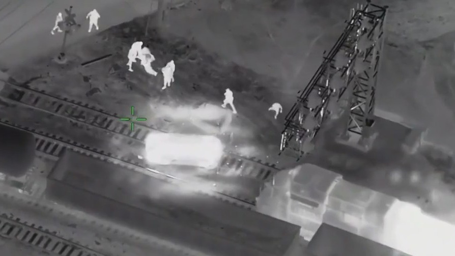Chaotic videos show police rescuing suspect from oncoming train | FOX 5 ...