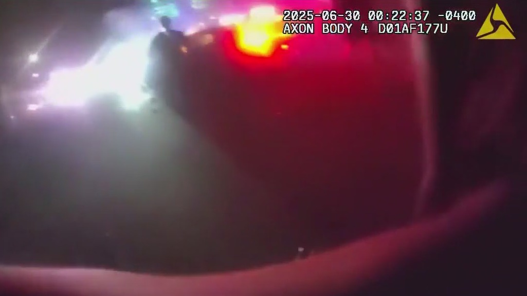 Officer saves driver from burning car | FOX 13 Tampa Bay