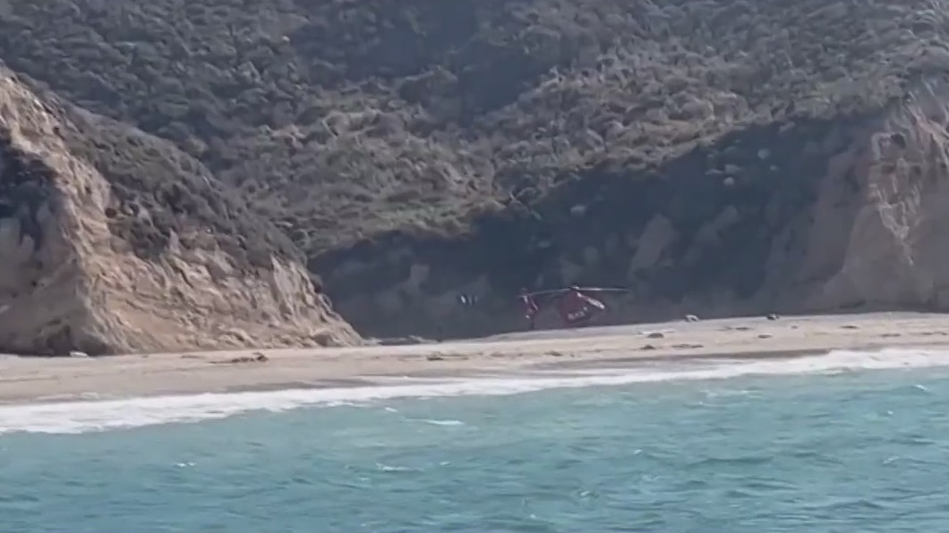 Coast Guard looks for swimmer after call came in about shark attack ...