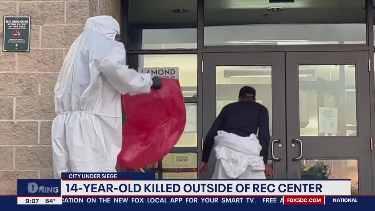 Crews cleanup bloody DC crime scene after 14-year-old boy gunned down ...