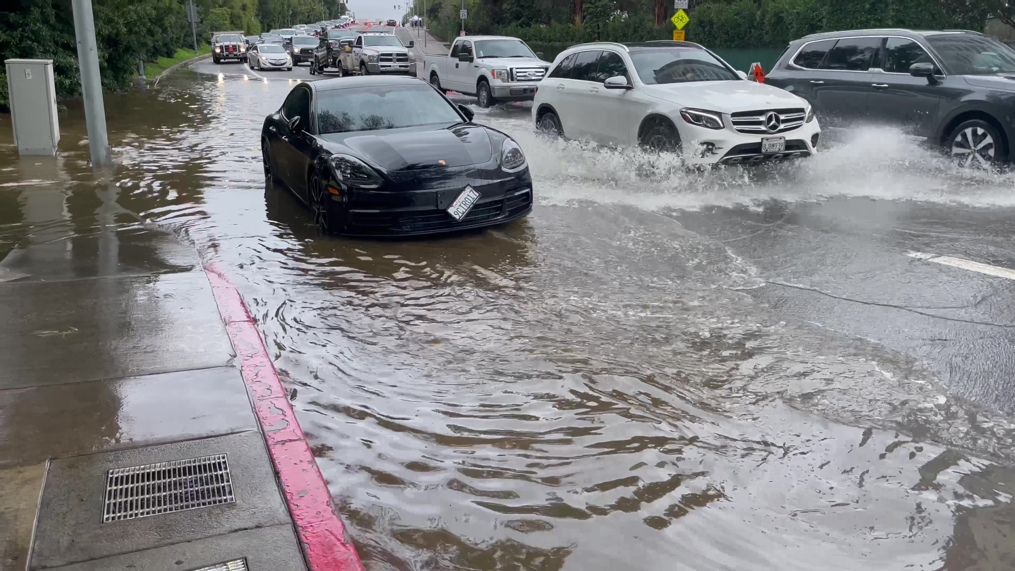 Beverly Hills flooding: Porsche is no match for flooded street | FOX 11 ...