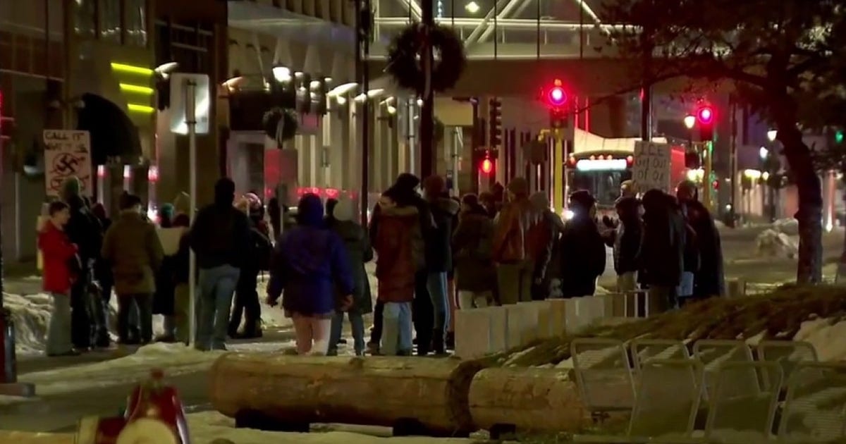 Protesters gather at Minneapolis City Hall after woman killed by ICE ...