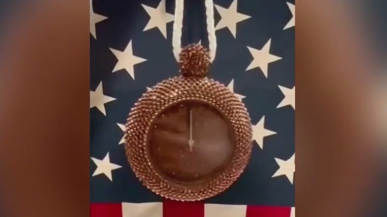 Flavor Flav's custom bronze clock for Jordan Chiles | FOX 5 Atlanta