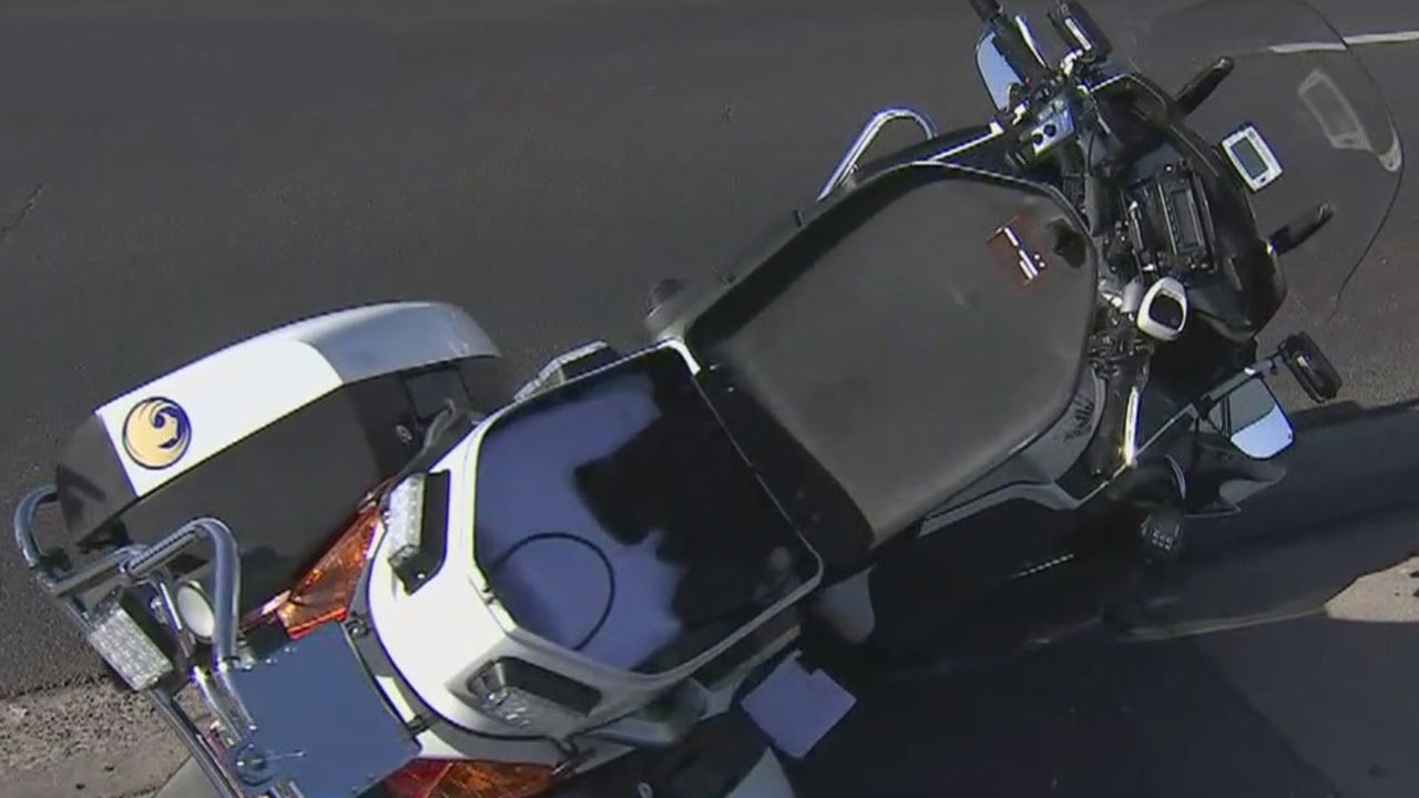 Phoenix police motorcycle officer OK after being rear-ended