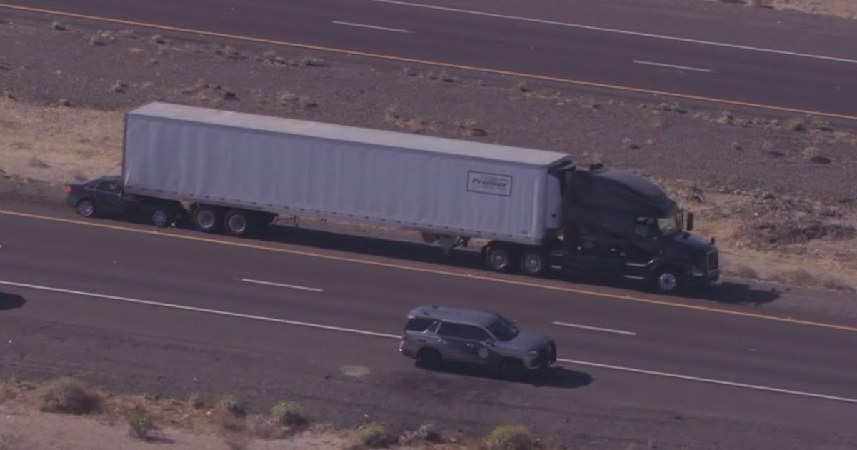 Car crushed underneath semi-truck on I-10 | FOX 10 Phoenix