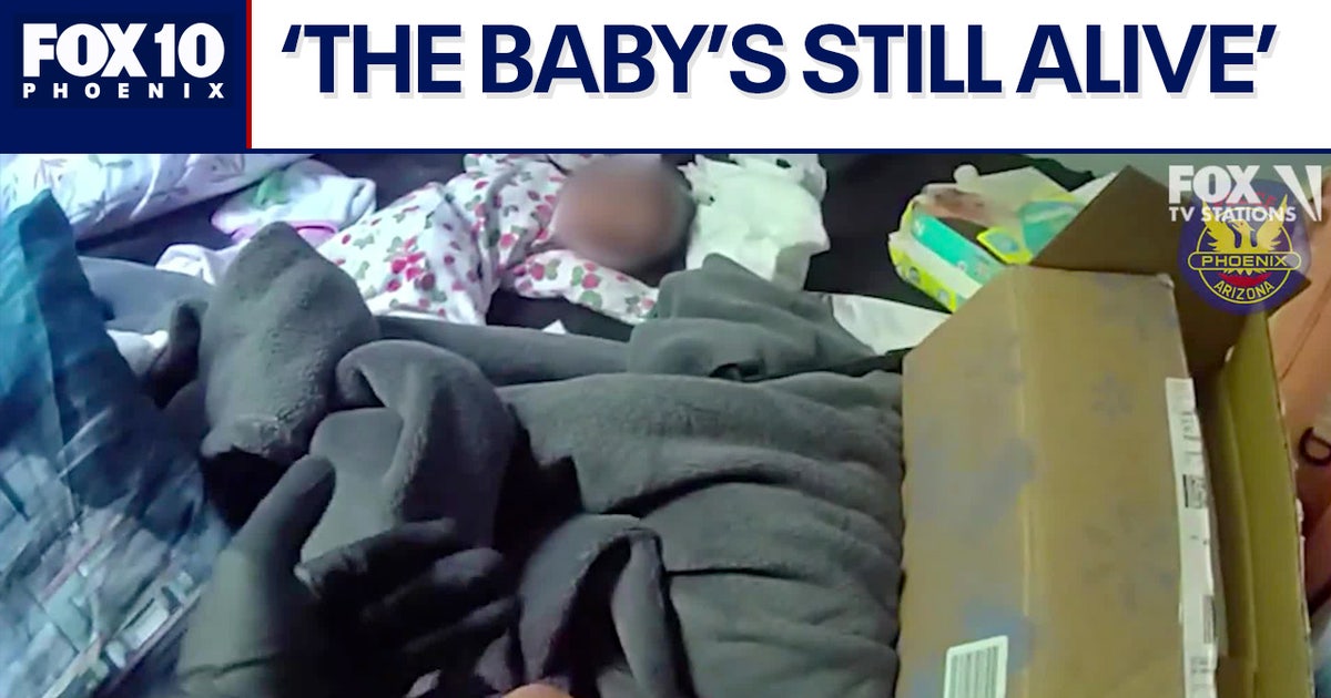 Police release video showing rescue of 'visibly emaciated' baby in ...