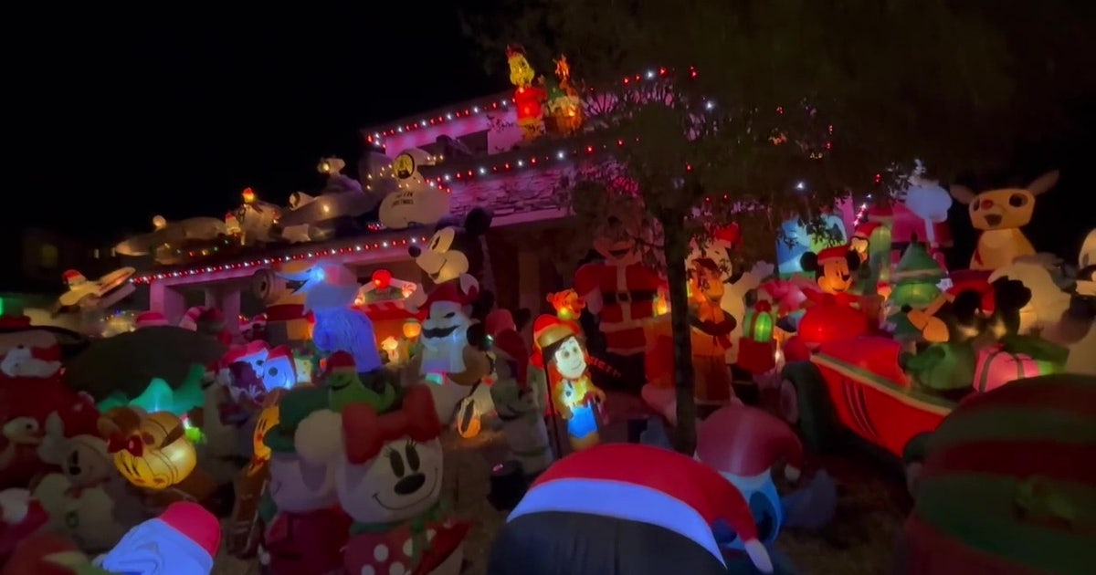The more the merrier: Goodyear home's yard filled with holiday ...