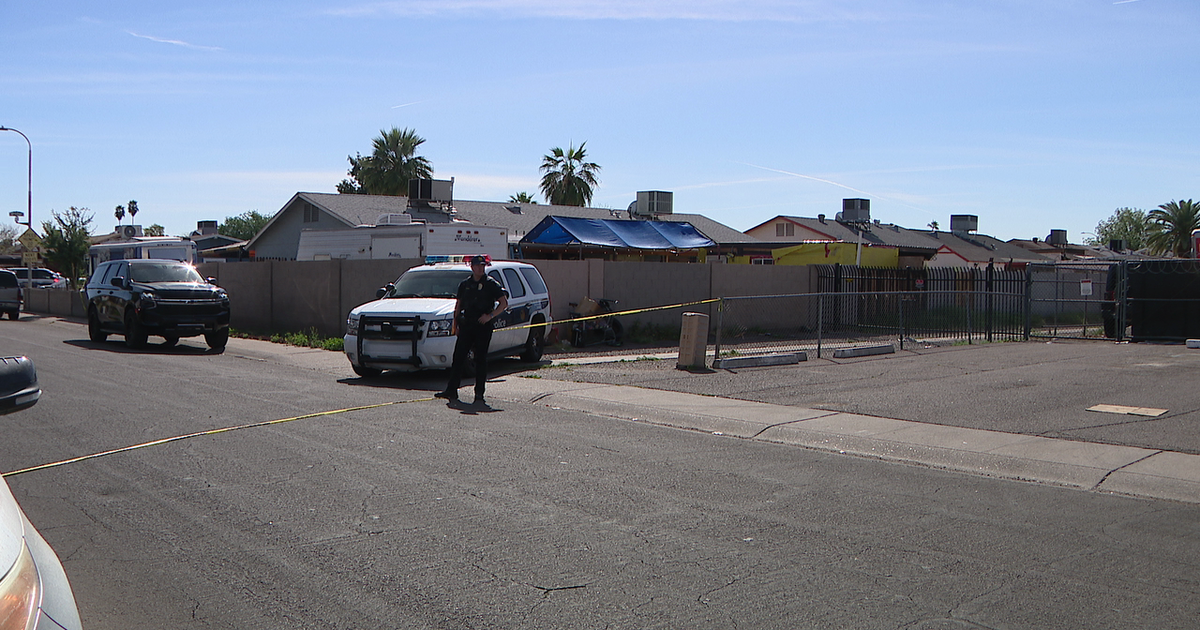 Woman, child rescued before officers fatally shoot man inside Phoenix ...