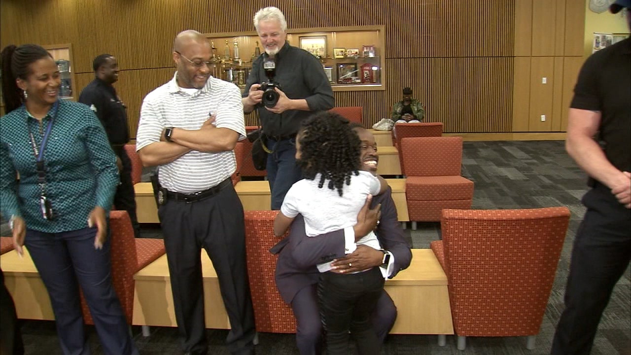 8-year-old girl to hug a police officer in every state