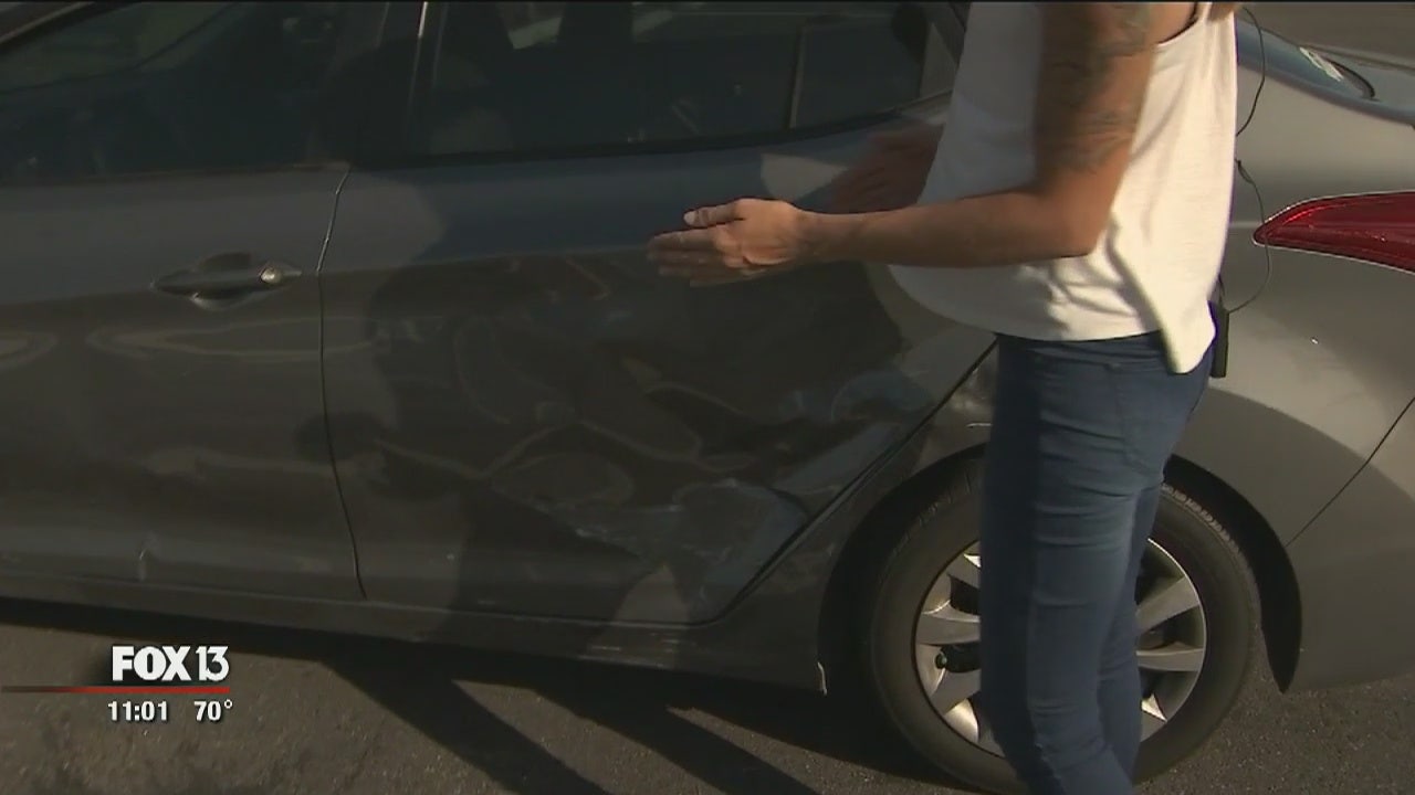 Road rage suspect turns herself in after ramming woman's car multiple ...