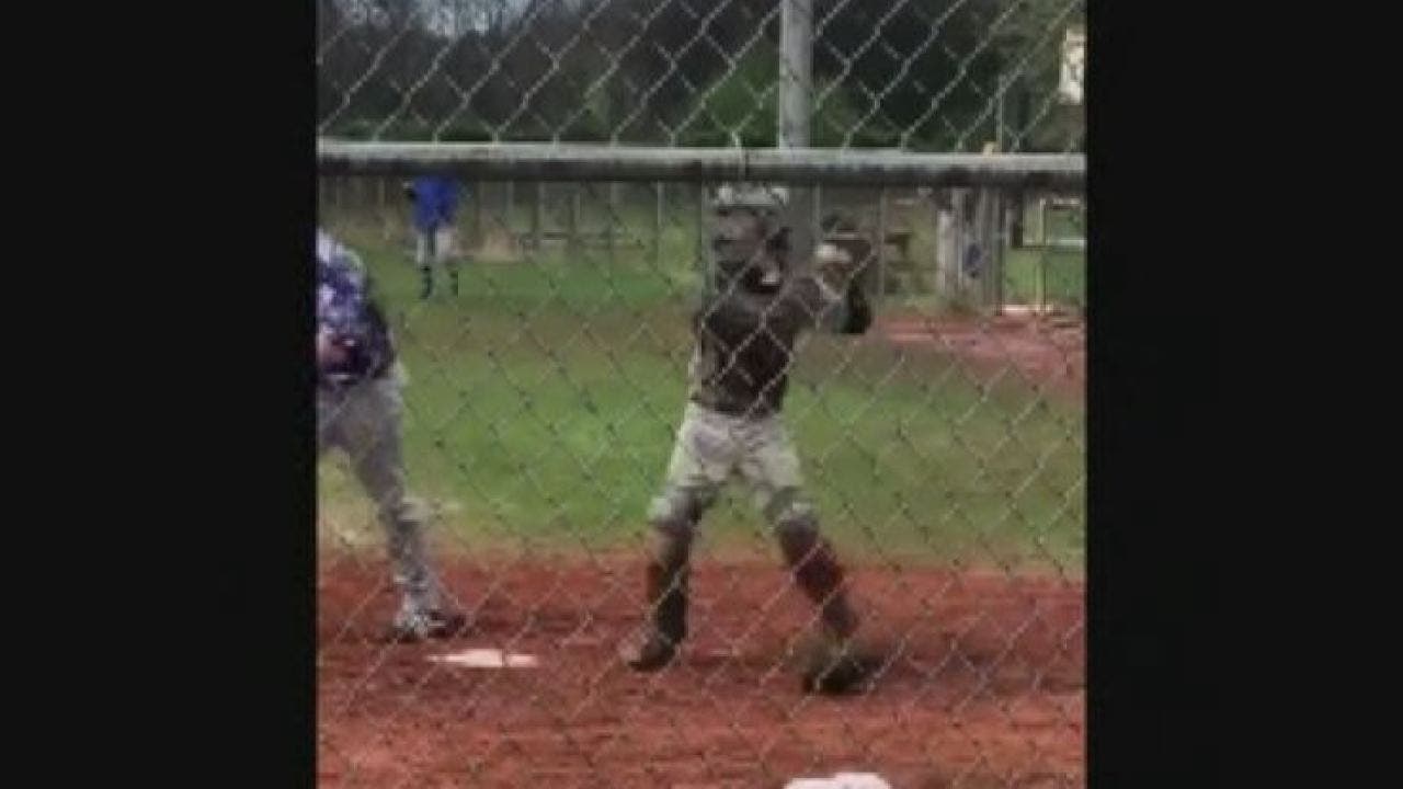 One-armed teen baseball catcher grabs attention of professional ...