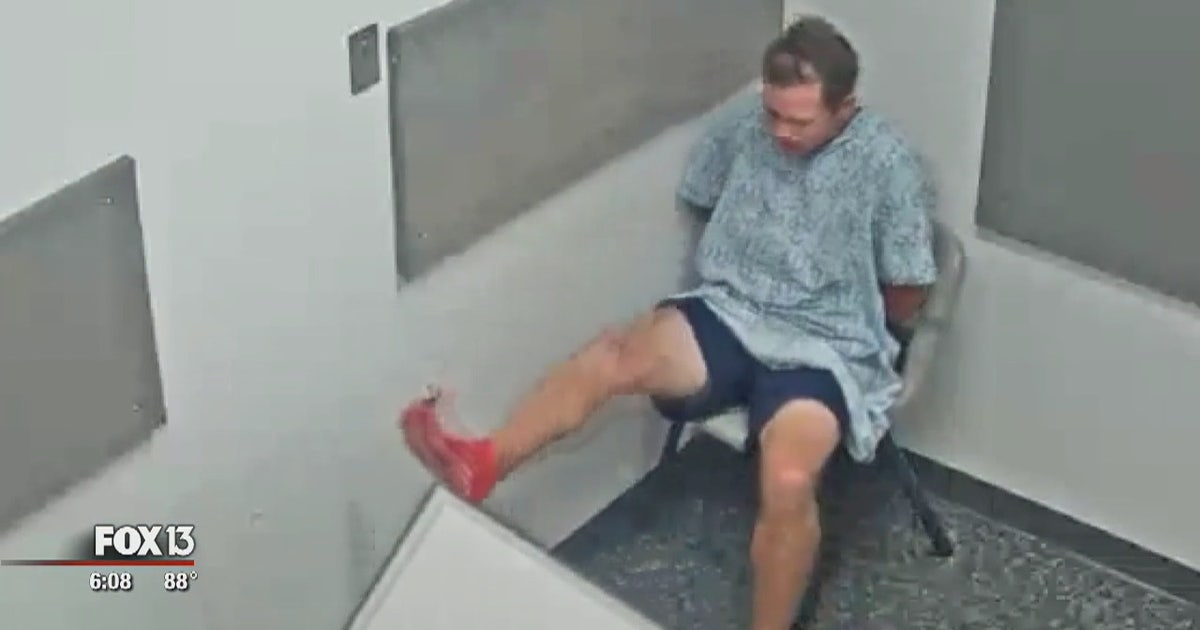 Video shows suspect kicking over table in interview room | FOX 13 Tampa Bay