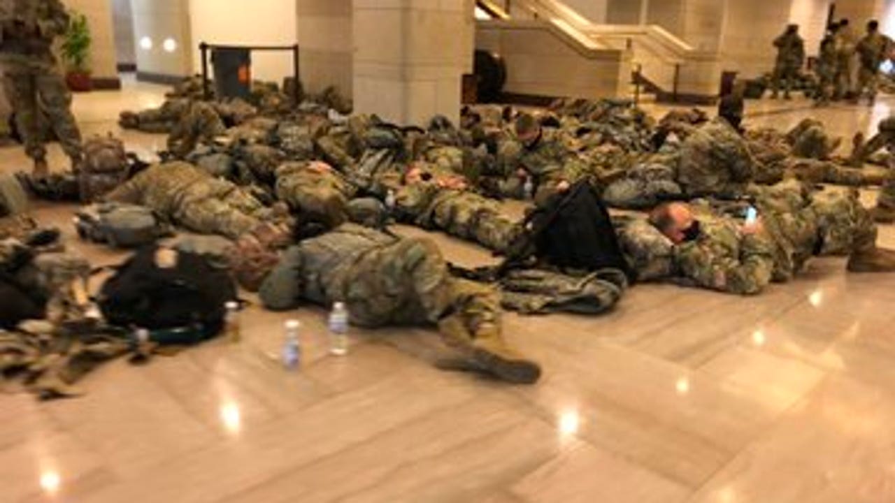 National Guard Troops Sleep On Capitol Floor As House Nears Trump