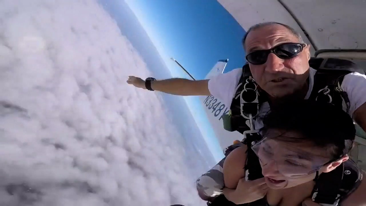 Tandem skydivers serve as both thrill-seekers and therapists while ...