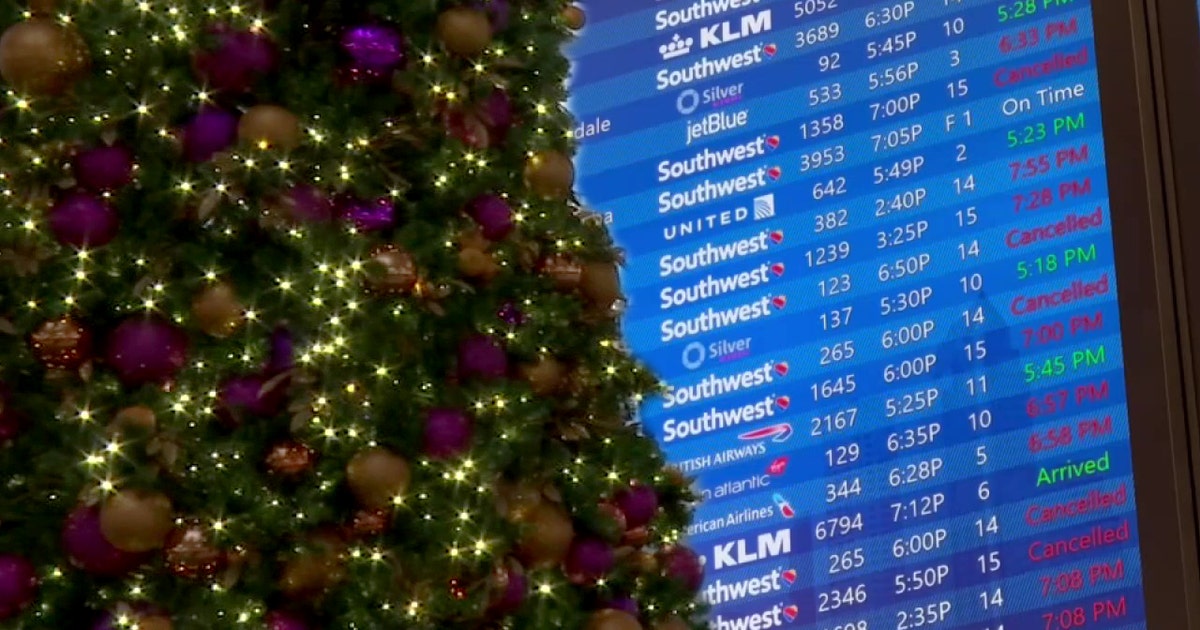 Travelers open Christmas presents at the airport after days trapped by ...