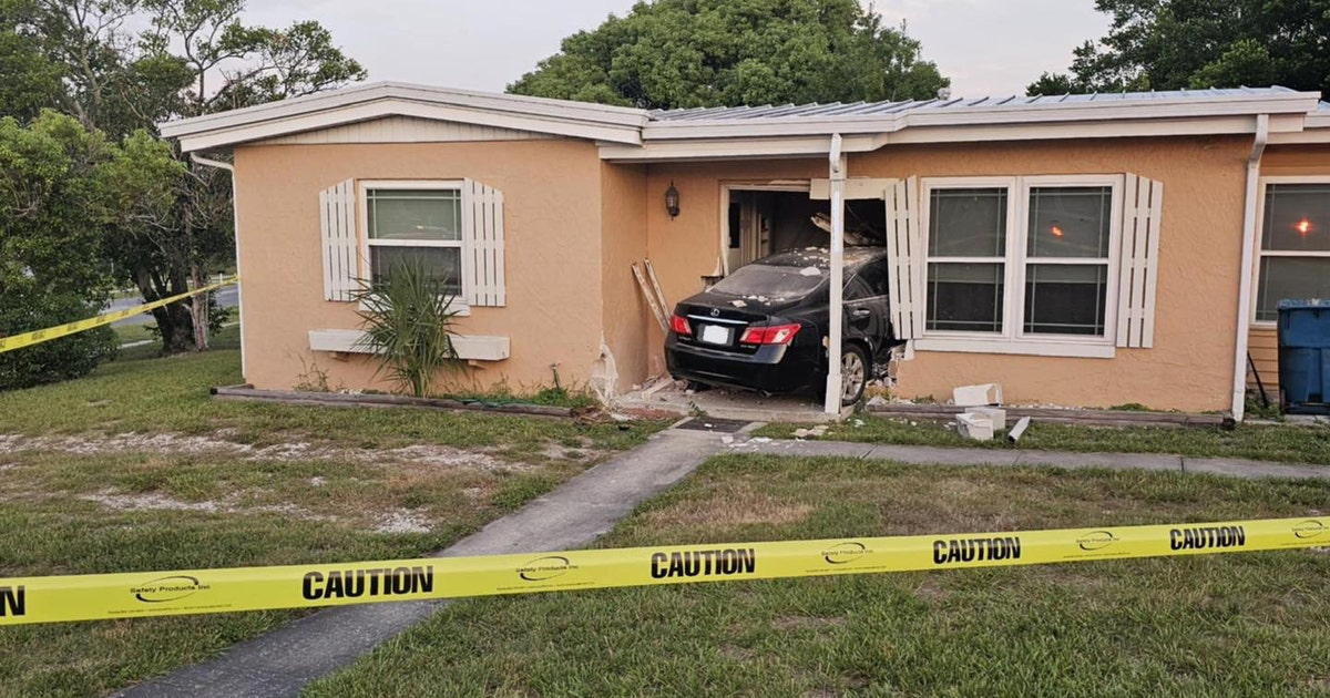 Car crashes into Spring Hill home, driver hospitalized | FOX 13 Tampa Bay
