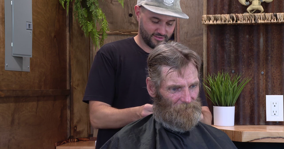 A fresh cut, a fresh start: Mobile barber trailer offers free haircuts ...