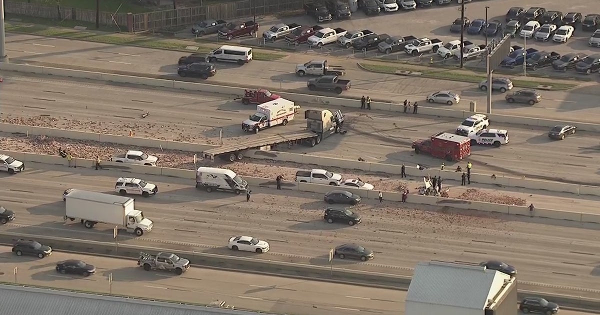 US-290 crash: 18-wheeler loses load of bricks, at least 2 injured | FOX ...