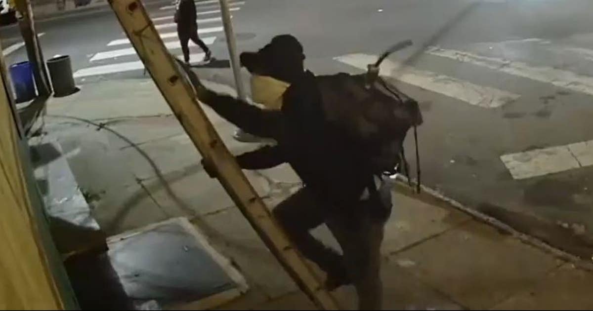 Caught on camera: Suspects climb ladder, drop from ceiling in North ...