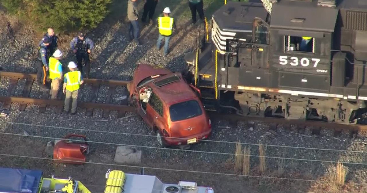Woman airlifted to hospital after freight train crash in Newfield ...