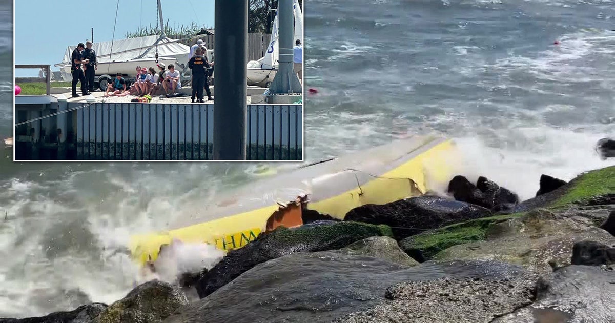 Boaters from sailing camp rescued after engine dies in choppy waters in ...