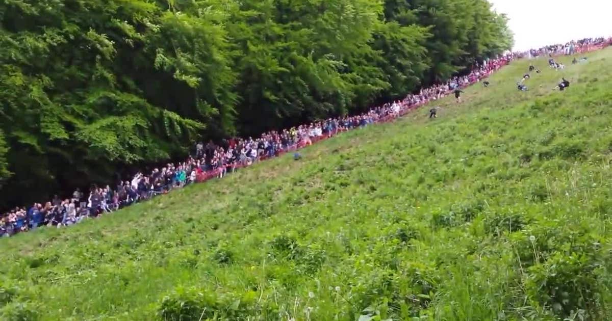 WATCH: People chase cheese rolling down hill in annual contest | FOX 2 ...