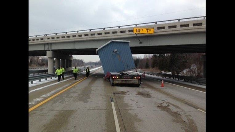 M59 closed at Crooks after semi hits overpass | FOX 2 Detroit
