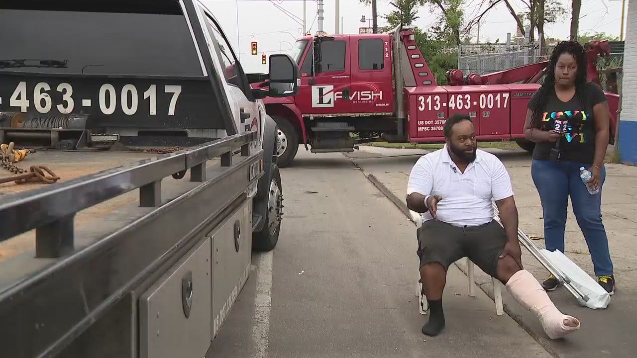 Tow truck driver somehow survives freeway hit and run in Detroit