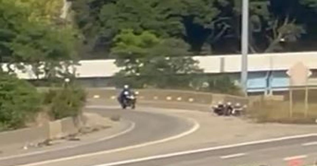 Video: Biden motorcade officer crashes motorcycle en route to Detroit ...