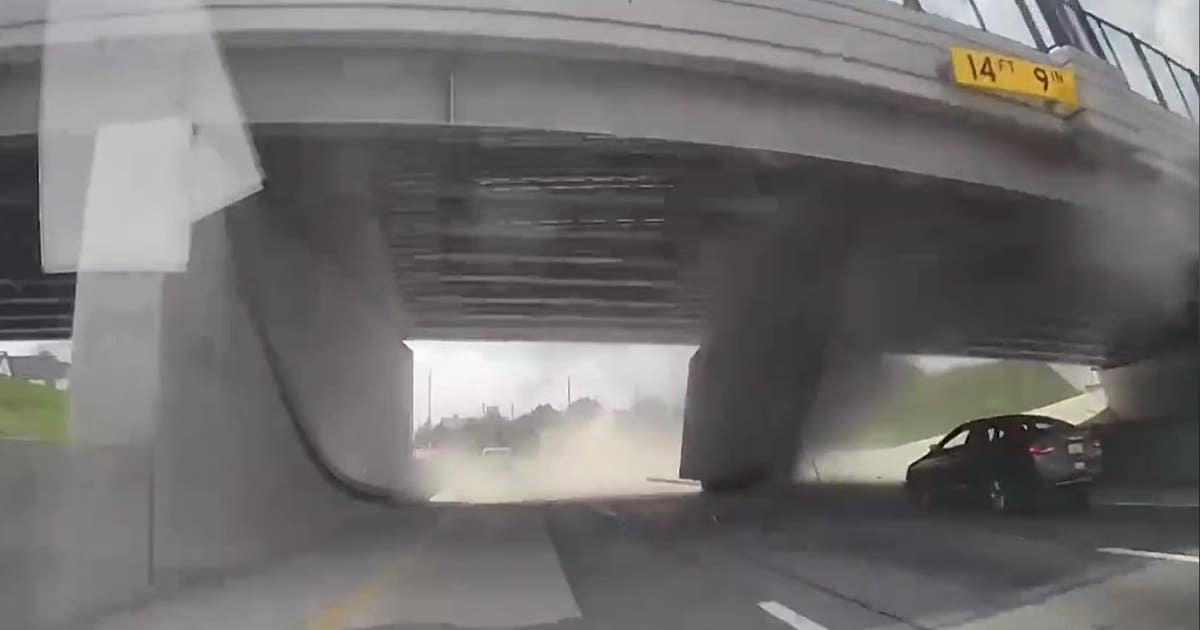 Video shows moment truck hauling gravel slams into overpass on I-94 in ...