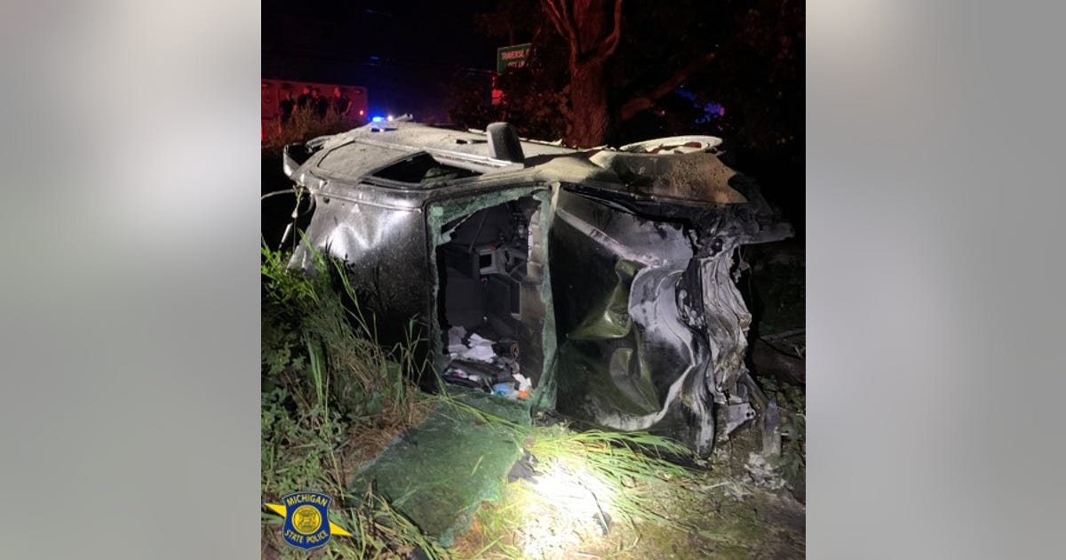 Two injured in northern Michigan crash when car strikes light pole ...