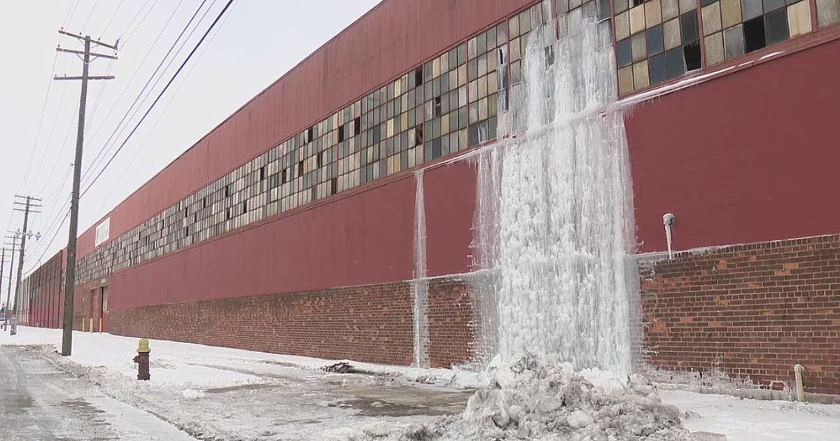 Frigid temps, broken pipes create ice waterfall at Detroit warehouse ...