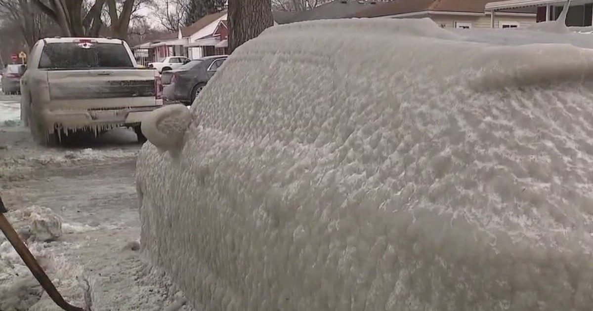Water main break leaves two Dearborn Heights cars frozen in a thick ...