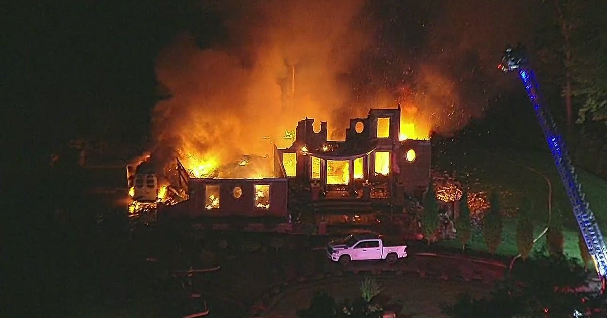 Massive fire destroys Independence Township home | FOX 2 Detroit