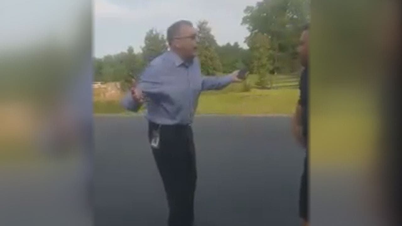 Driver in racially-charged tirade during road rage dispute charged with ...