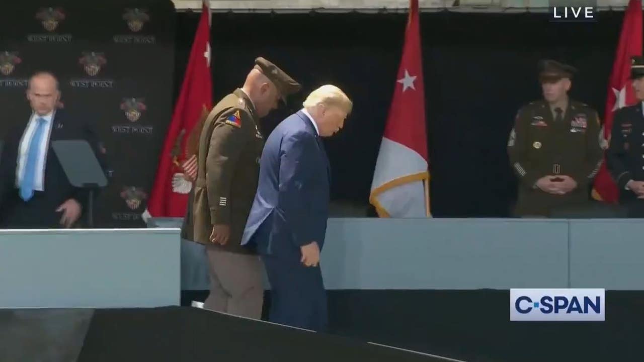 Videos of Trump walking on ramp, lifting glass with two hands put him ...