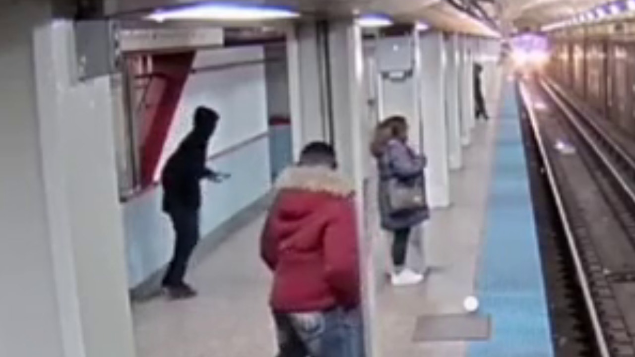 Shocking video shows man pushing woman onto CTA tracks as train pulls ... Shocking video shows man pushing woman onto CTA tracks as train pulls ...
