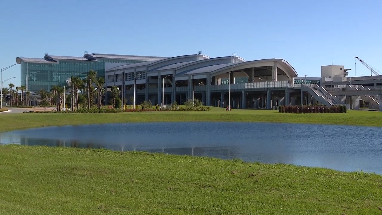 New pedestrian bridge at Orlando International connects Terminal C to ...