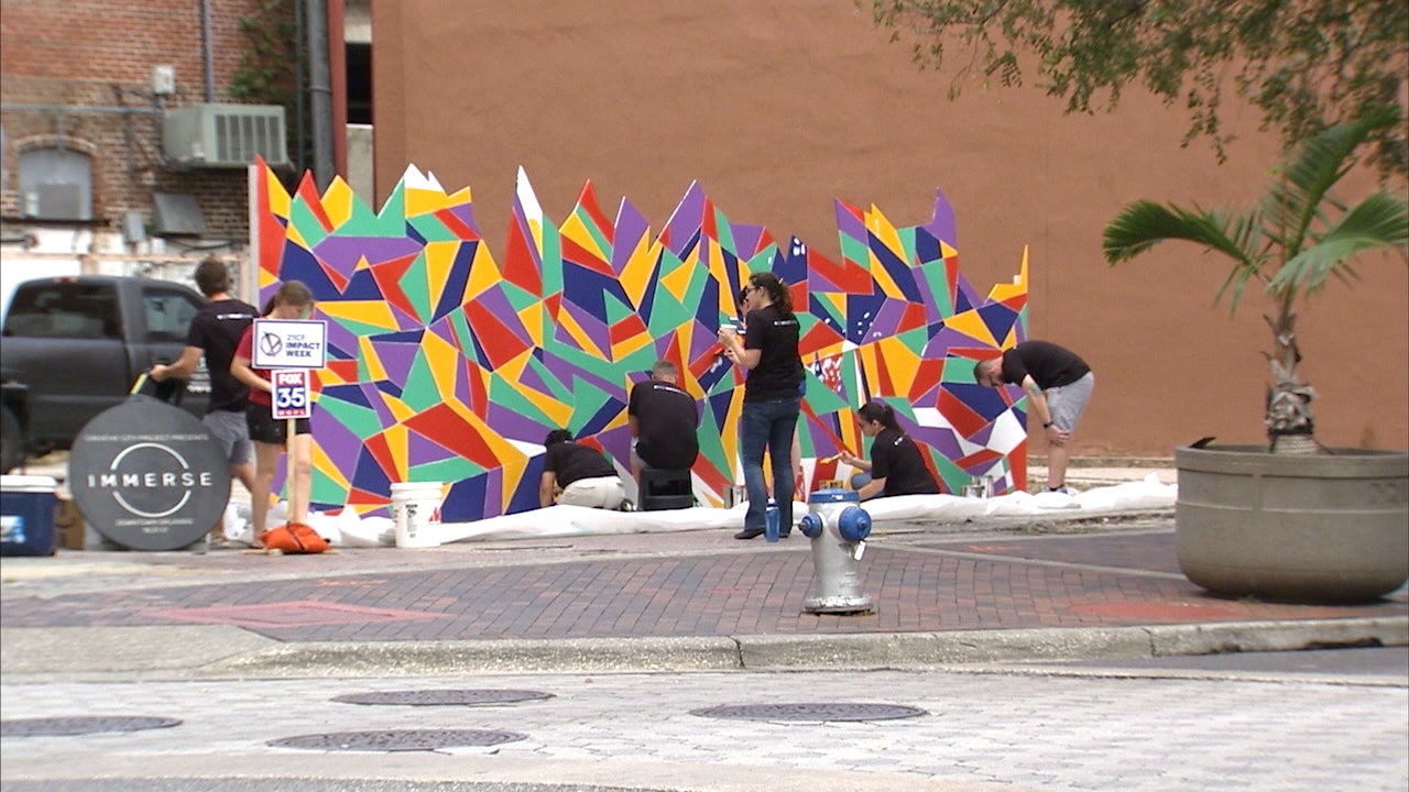 Final touches on FOX 35, Creative City art project, part of 21CF Impact ...