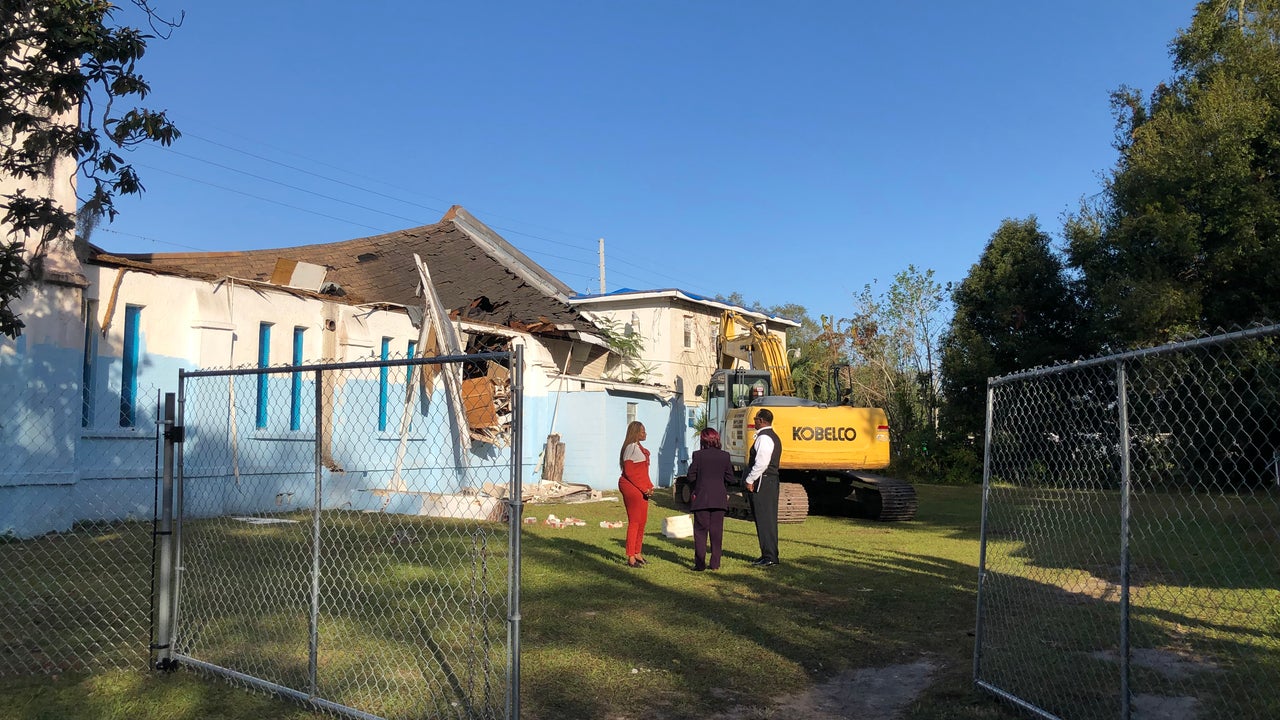 Structural engineer assessing damage after historic church roof ...