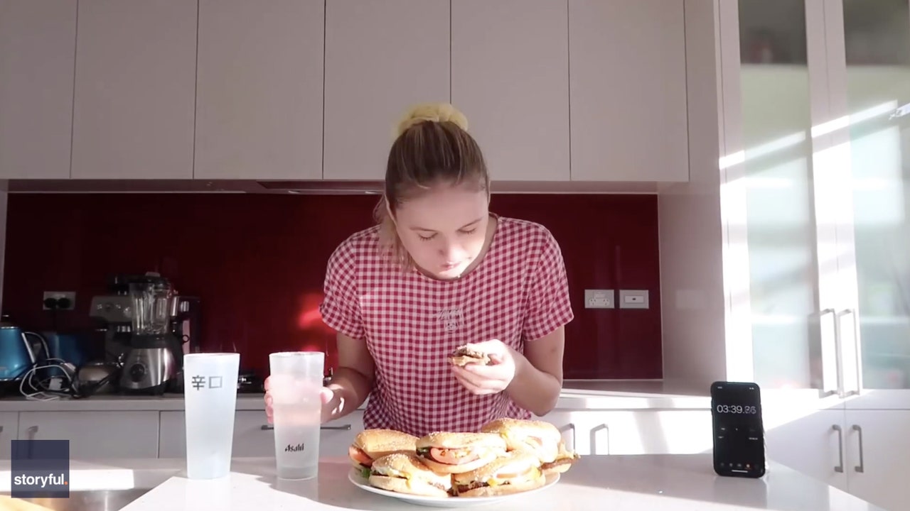 Competitive eater medical student devours stack of Whopper burgers in ...