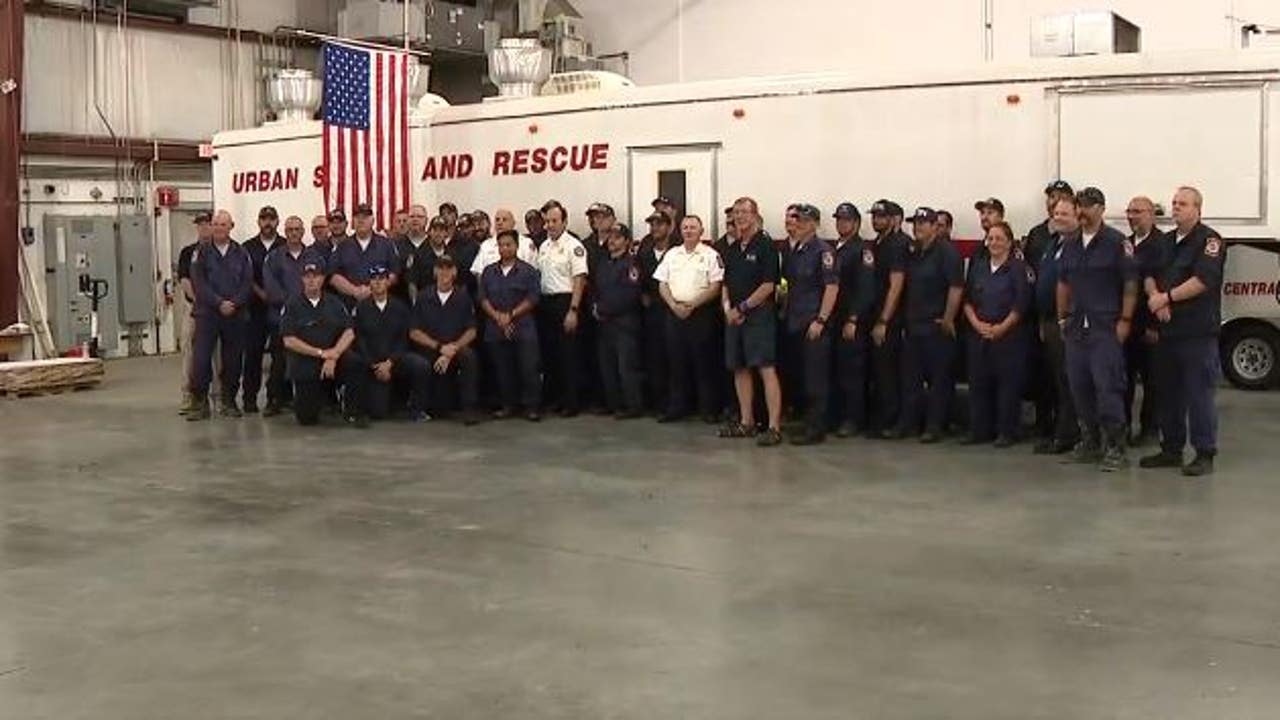 Rescue crew welcomed home after returning from Surfside condo collapse ...
