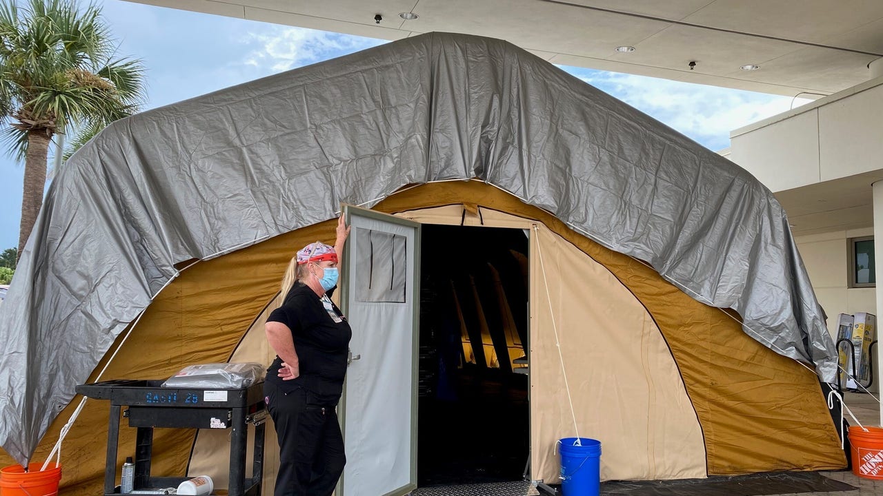 Overflow treatment tents going up outside Health First hospitals | FOX ...