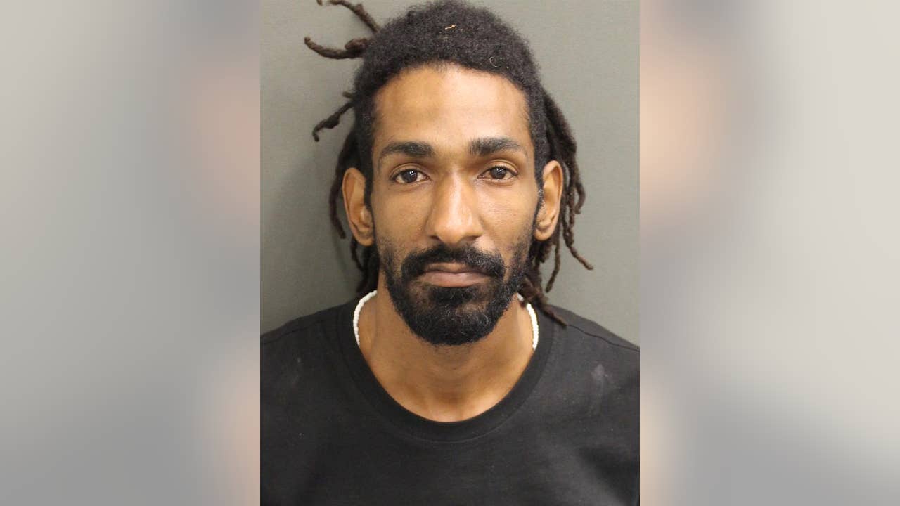 Man arrested for shooting at two people parked in a car at Orlando ...