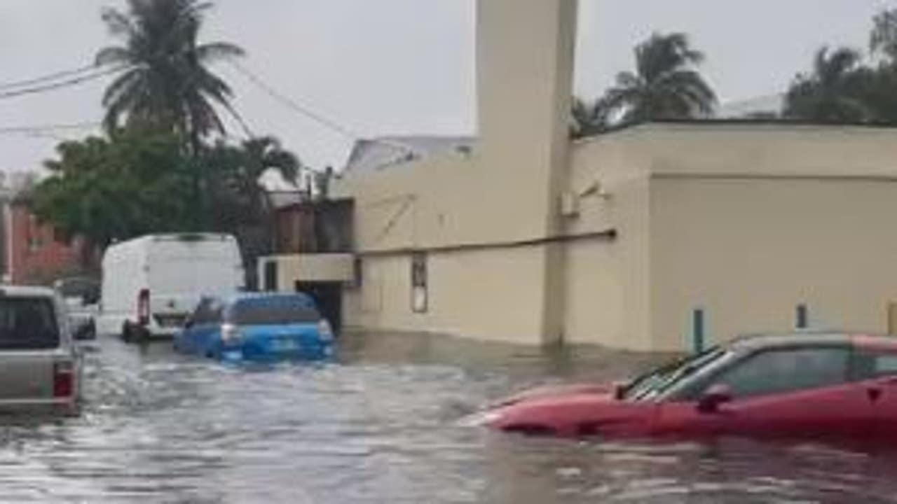 Watch: Flooding from potential tropical system leaves multiple cars ...