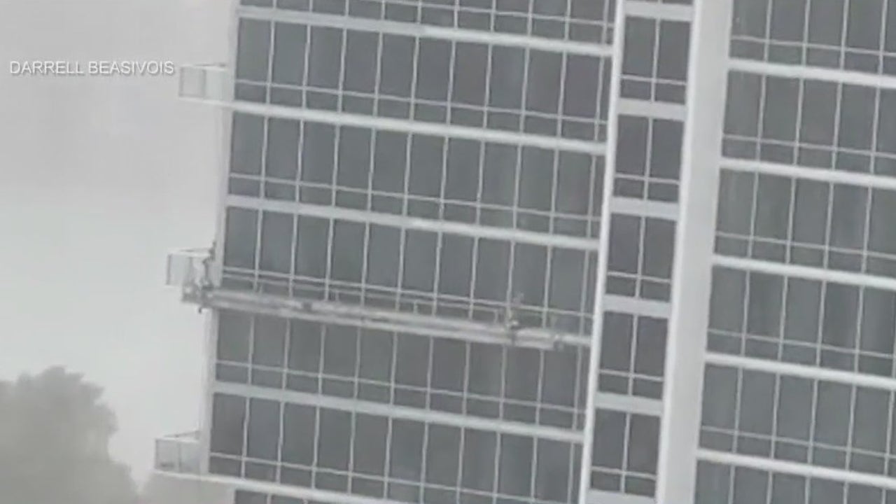 2 window washers escape Orlando high-rise platform during dangerous ...
